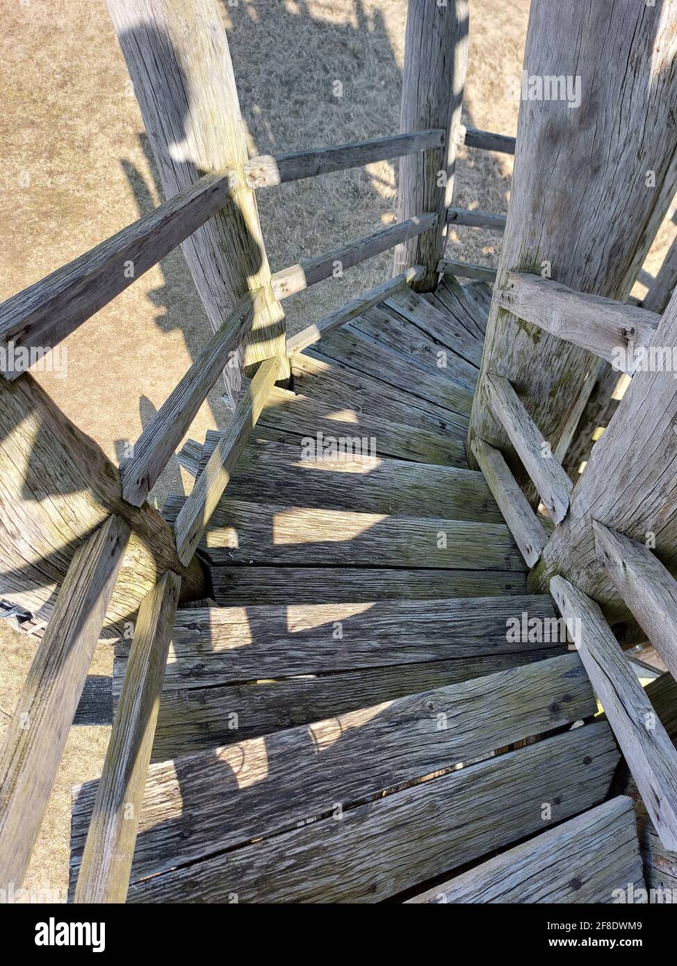 Vertical shot of an old, winding wooden steps Stock Photo - Alamy