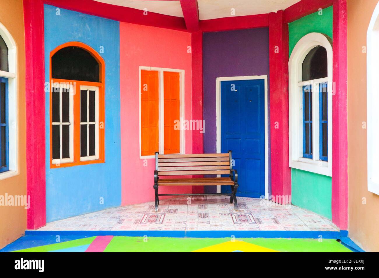 Bench In The Colorful Room Stock Photo - Alamy