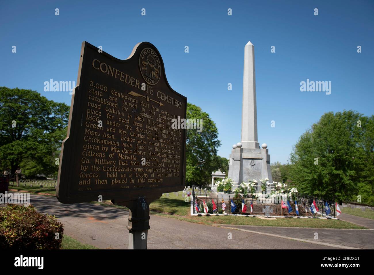 Marietta, GA, USA. 13th Apr, 2021. Easter lilies and flags of Southern ...
