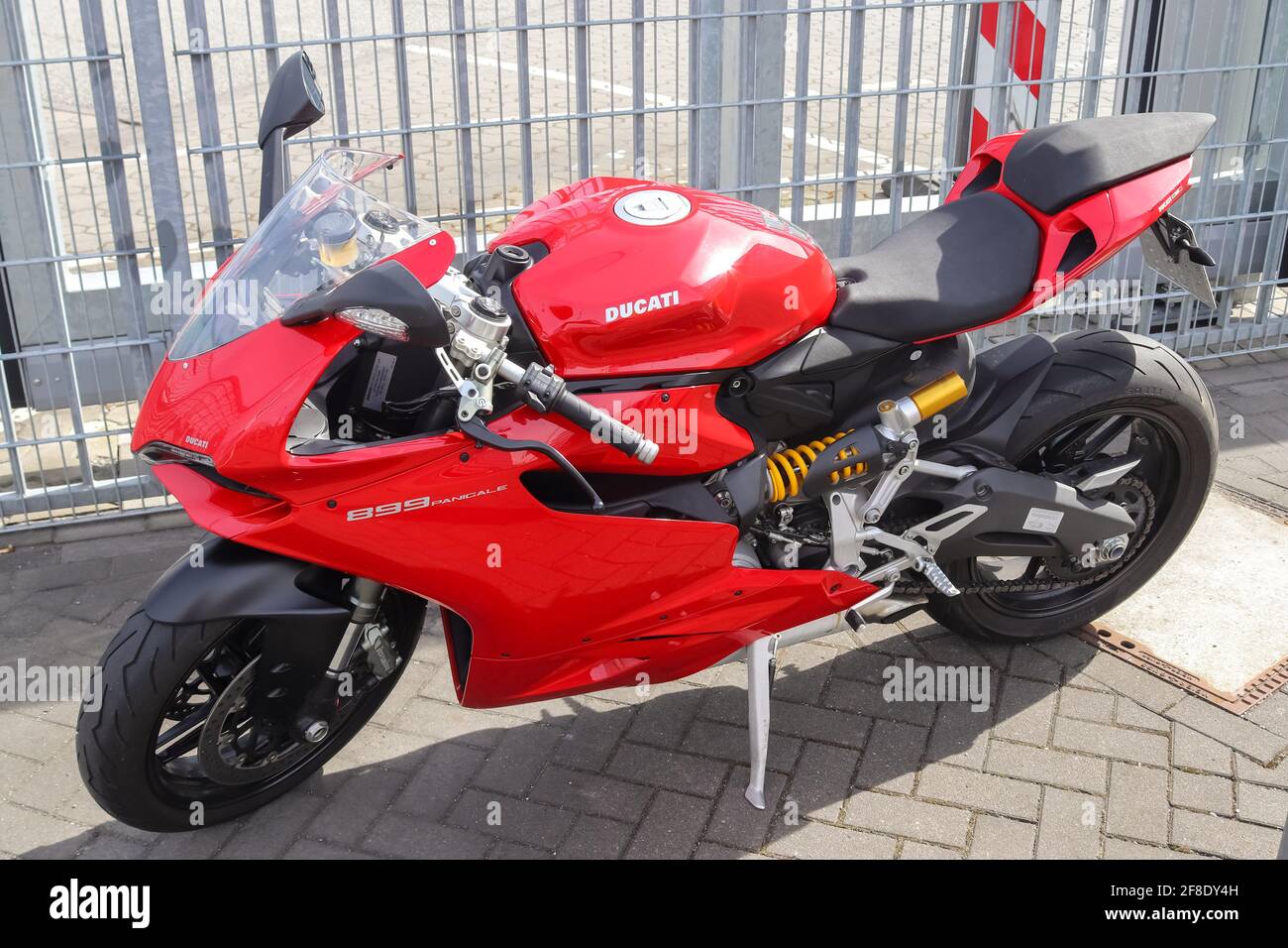 Red ducati bike standing on a road Stock Photo - Alamy