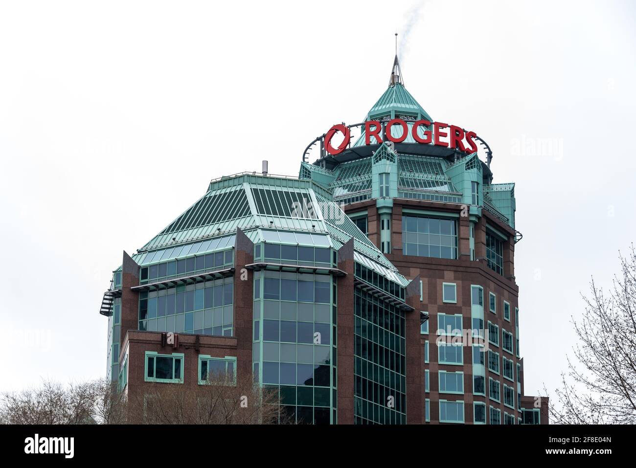 Rogers Telecommunication Company logo on top of a building seen from ...
