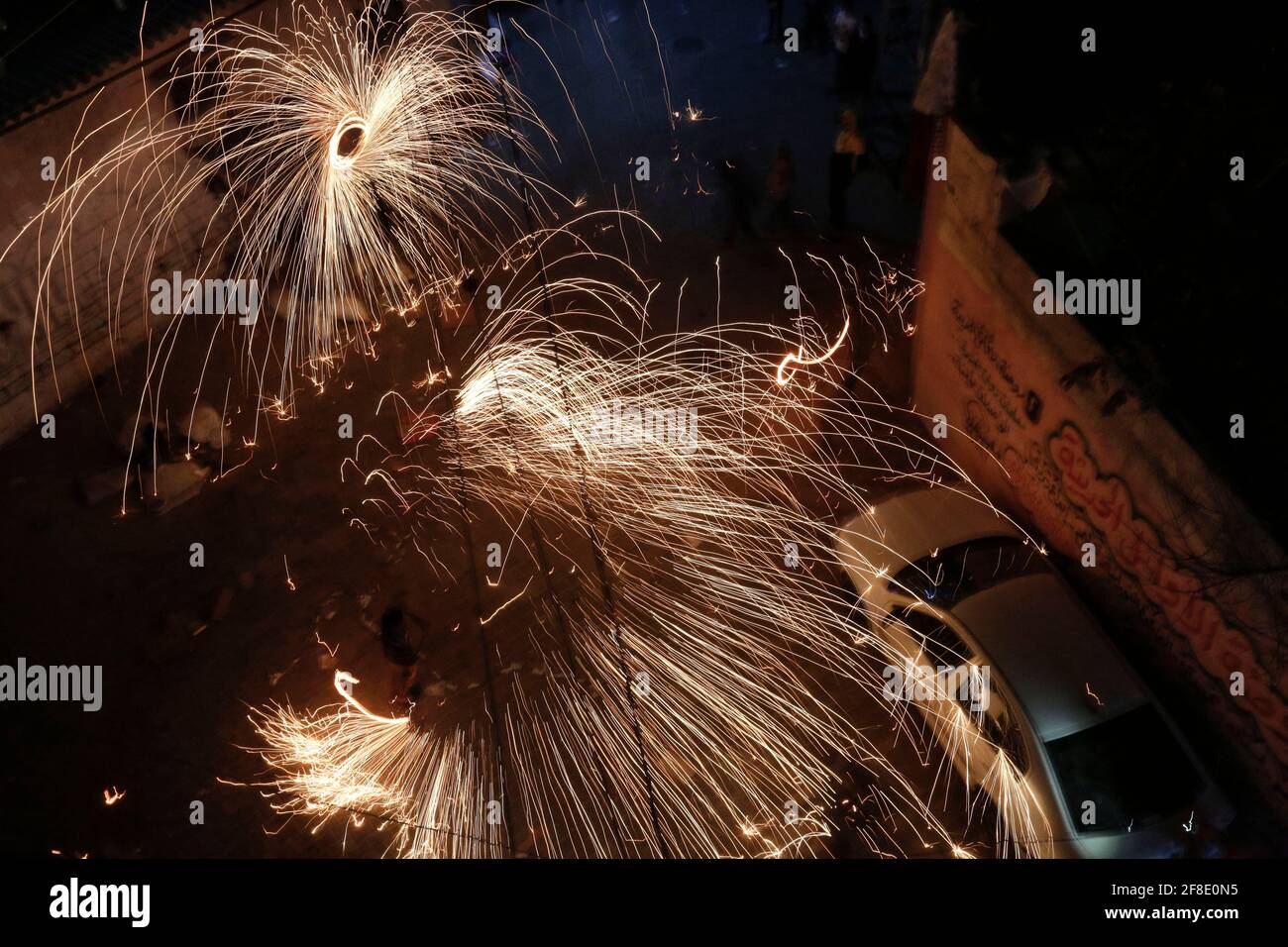 Gaza City, The Gaza Strip, Palestine. 13th Apr, 2021. Palestinians wave ...