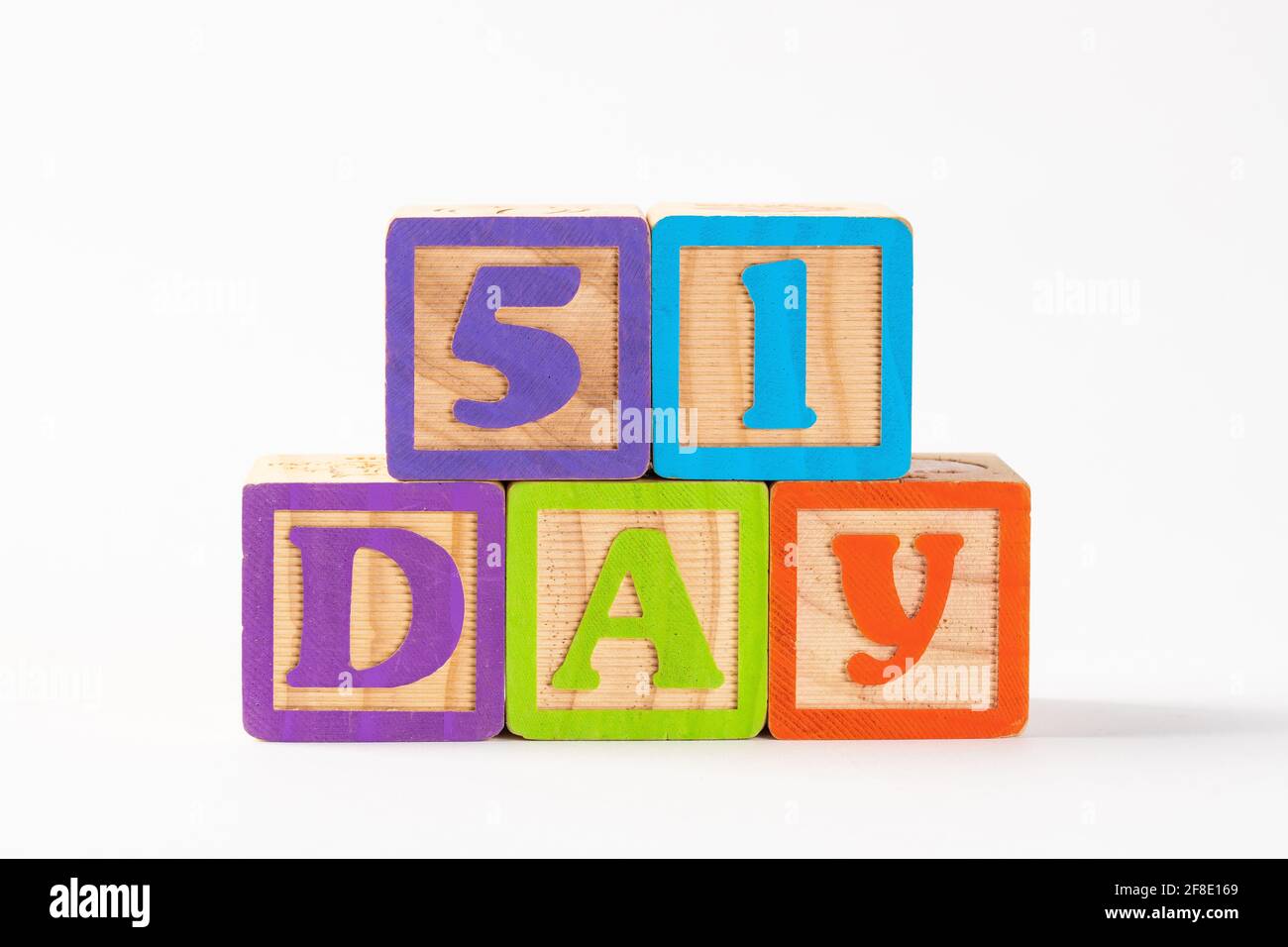Numbers 5 and 1 with day letter wooden blocks isolated on white ...