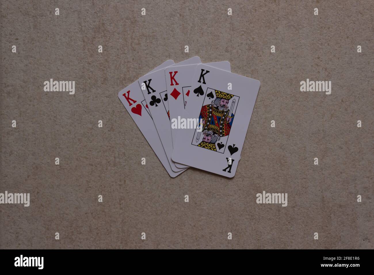 Four cards forming a poker of kings Stock Photo - Alamy