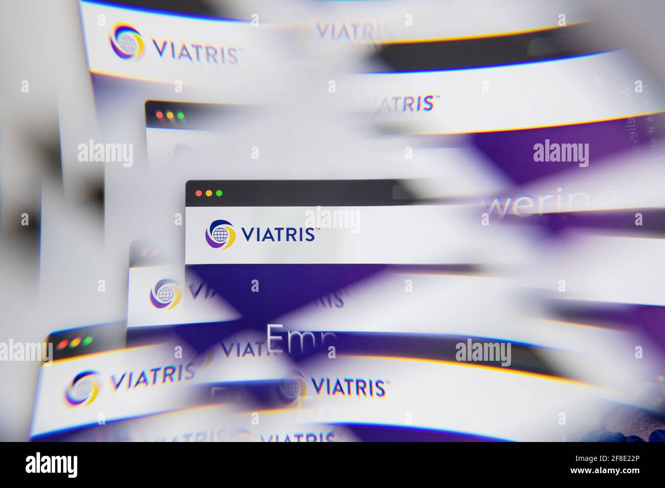 Milan, Italy - APRIL 10, 2021: Viatris logo on laptop screen seen through an optical prism ...