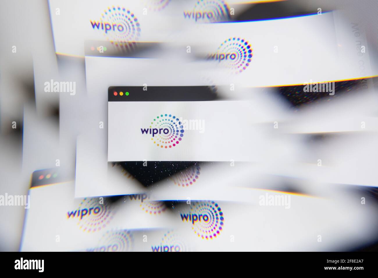 Milan, Italy - APRIL 10, 2021: Wipro logo on laptop screen seen through ...