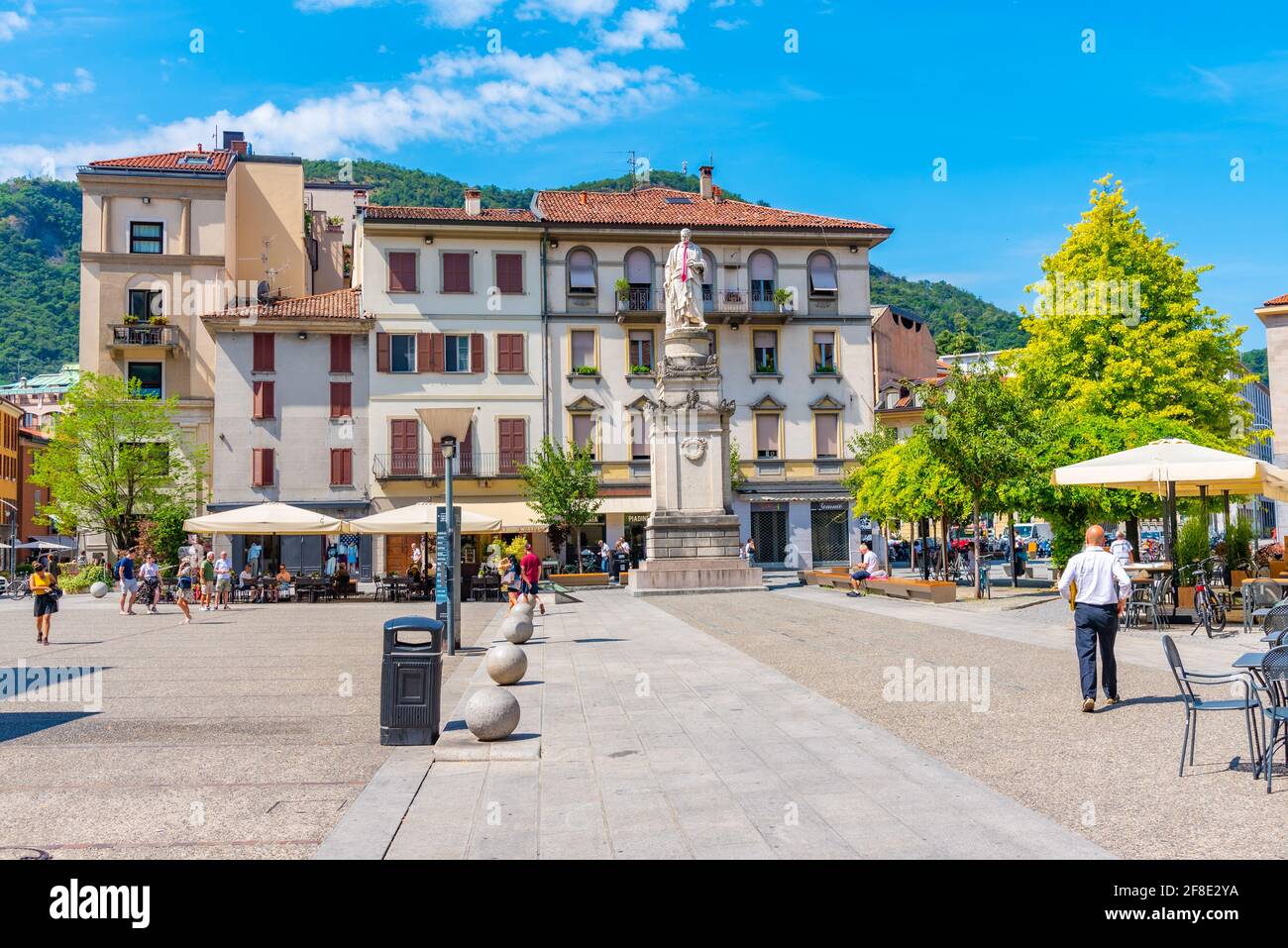 COMO, ITALY, JULY 17, 2019: People are strolling on Piazza Alessandro ...