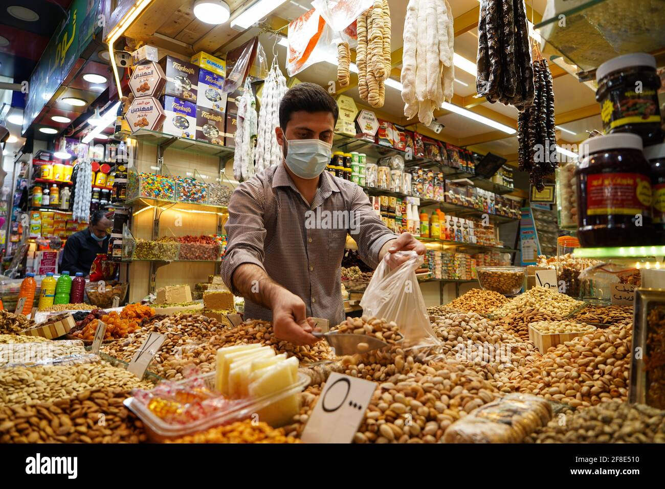An Iraqi Kurdish man sells Nuts on the first day of the Muslim holy ...