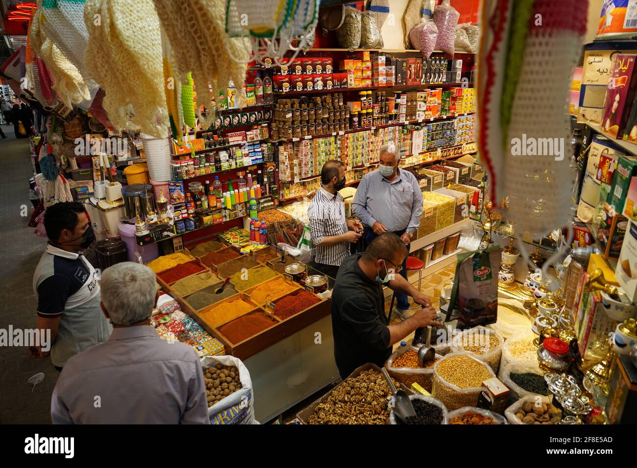 Duhok, Iraq. 13th Apr, 2021. An Iraqi Kurdish man sells Spices on the ...