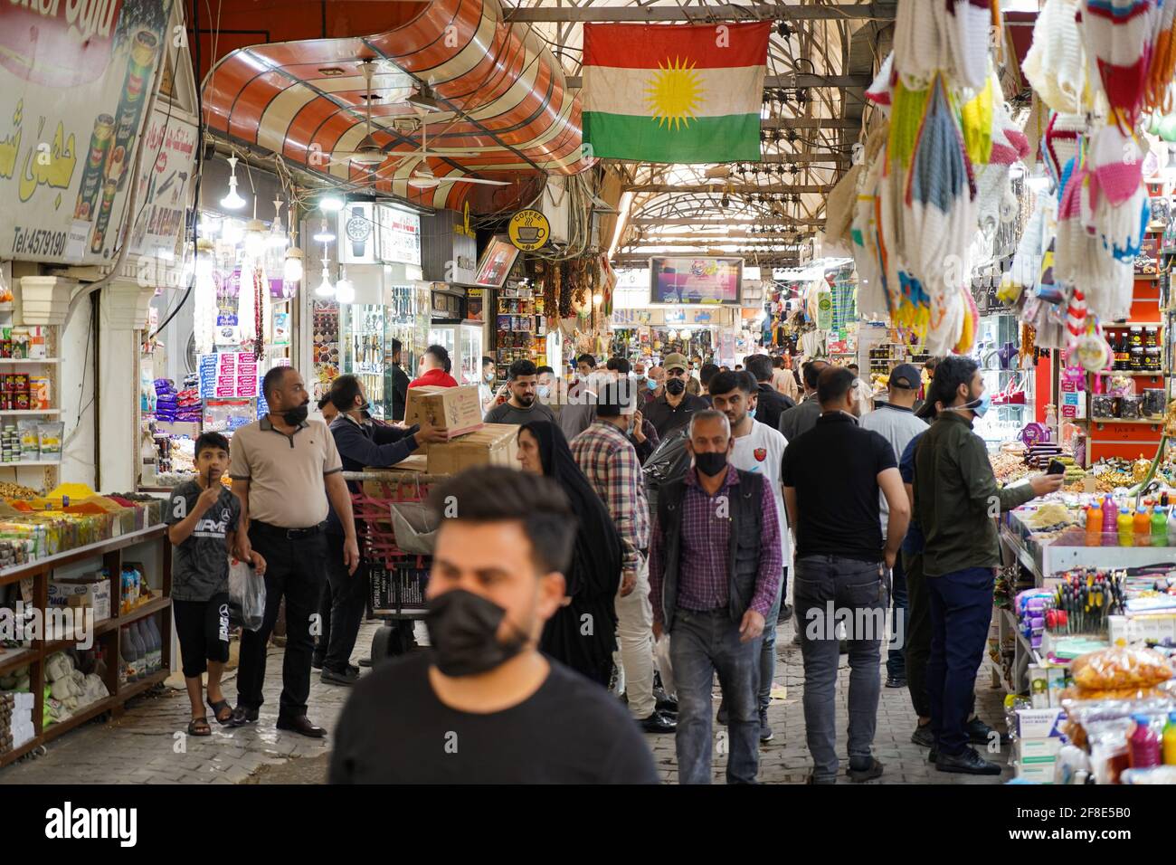 Duhok, Iraq. 13th Apr, 2021. A general view of the market crowded with ...
