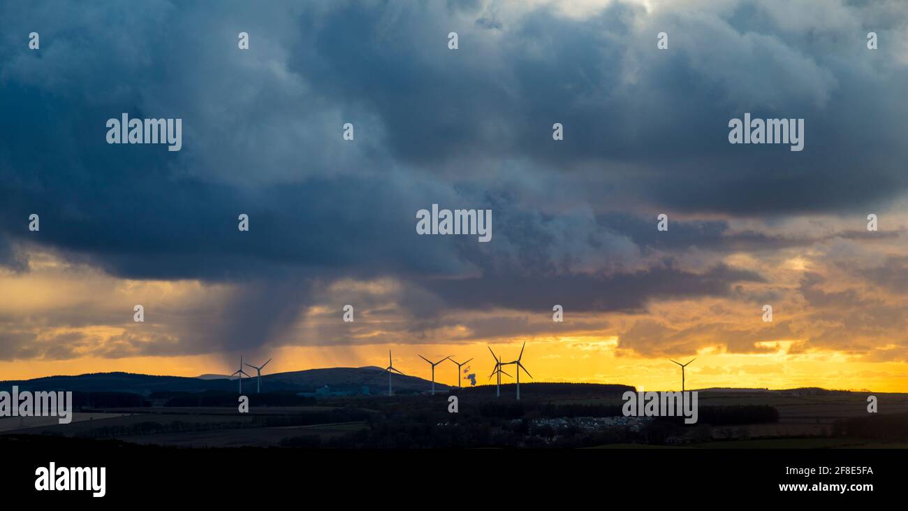 wind turbines sunset Stock Photo - Alamy