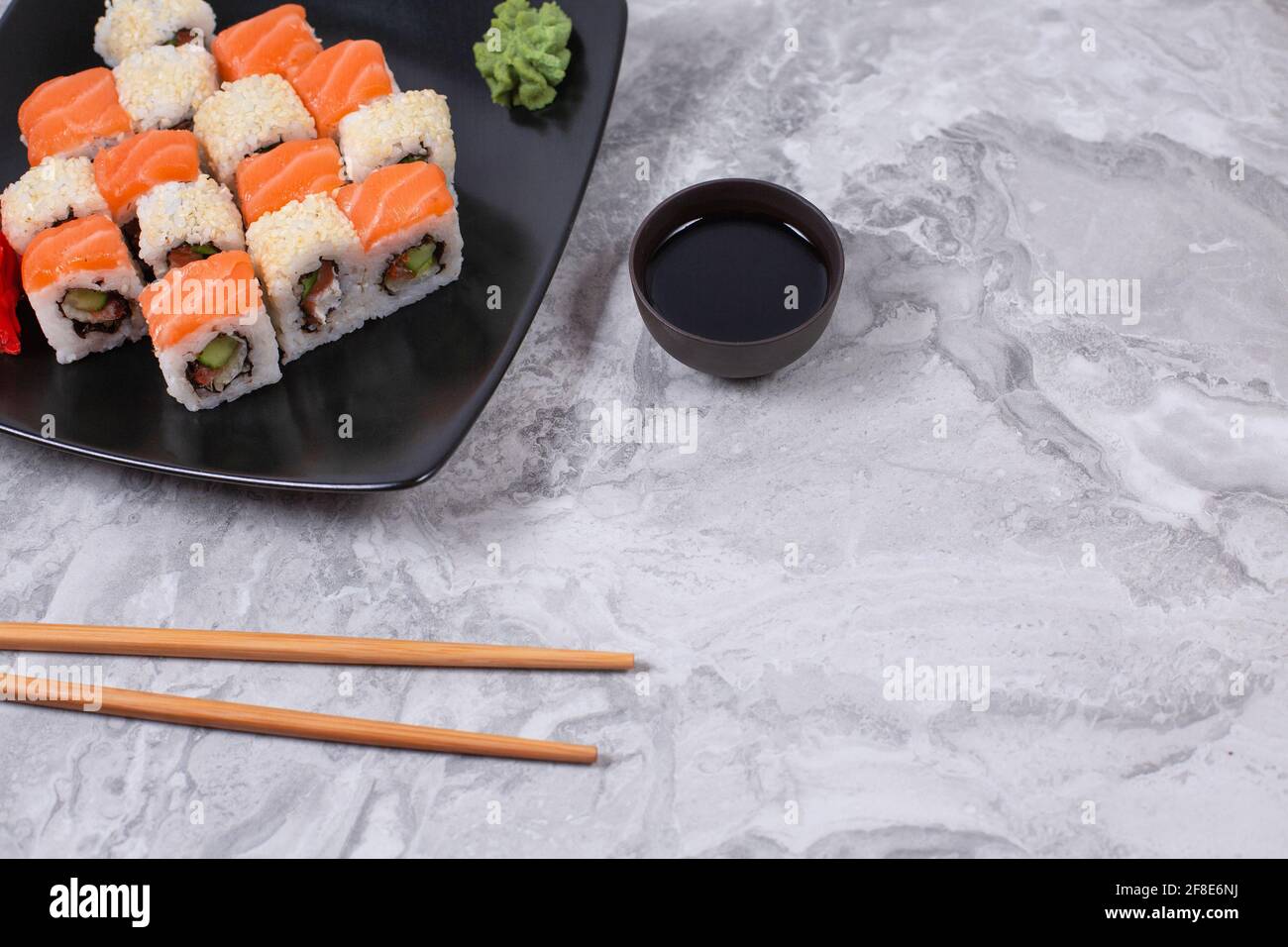 Sushi and sushi roll set on stone table top view. Top view Stock Photo ...