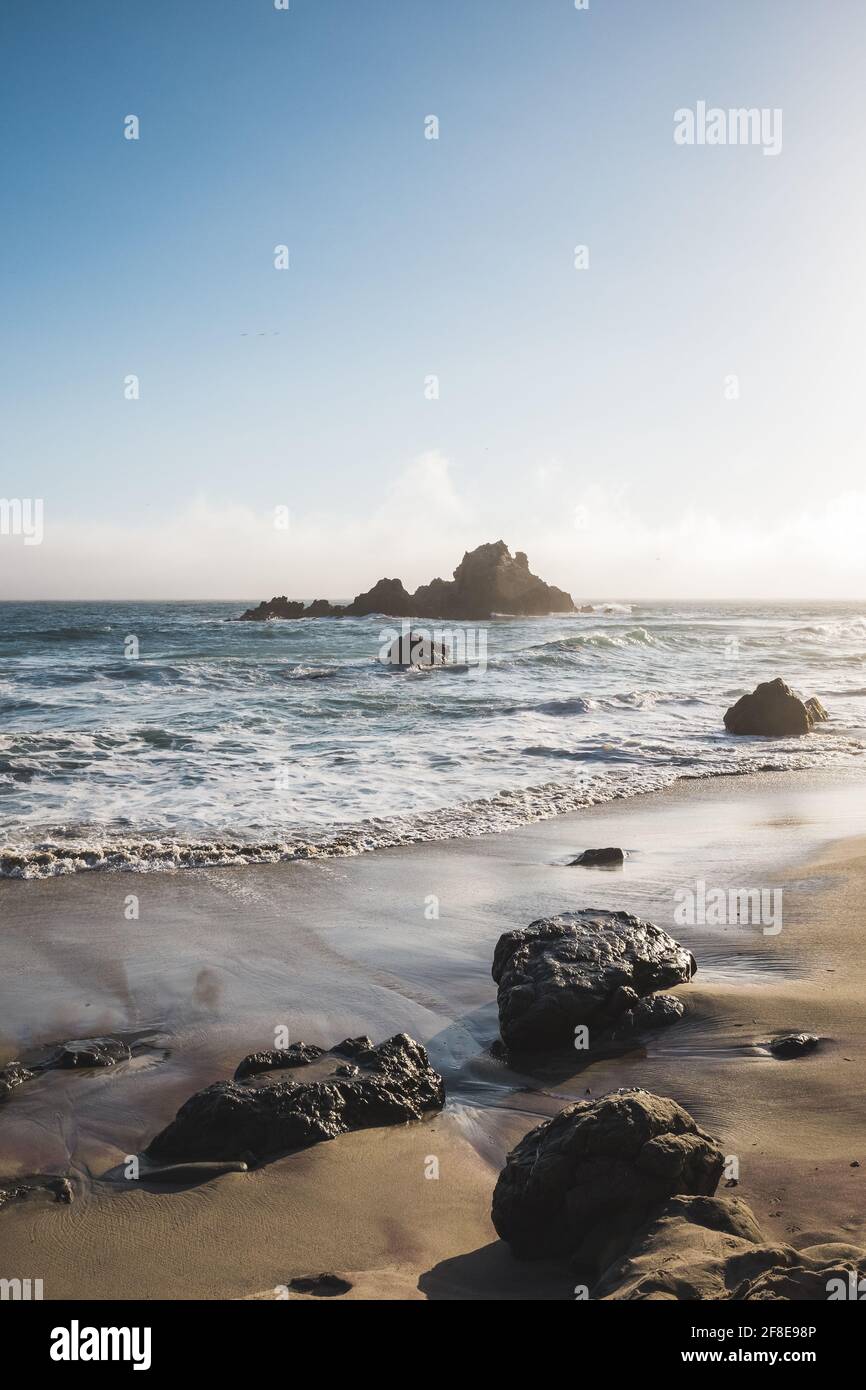 Vertical shot of a beautiful rocky seashore in Big Sur, California ...