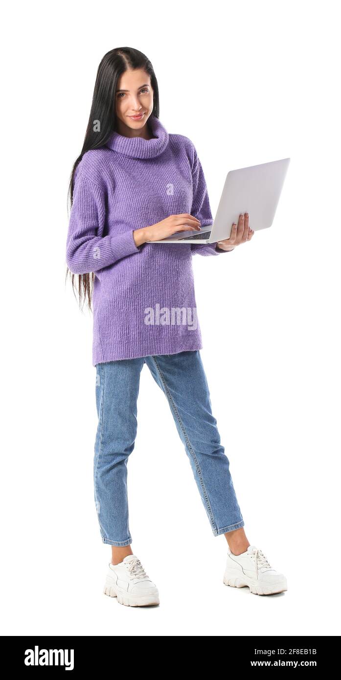 Beautiful young woman with laptop on white background Stock Photo - Alamy