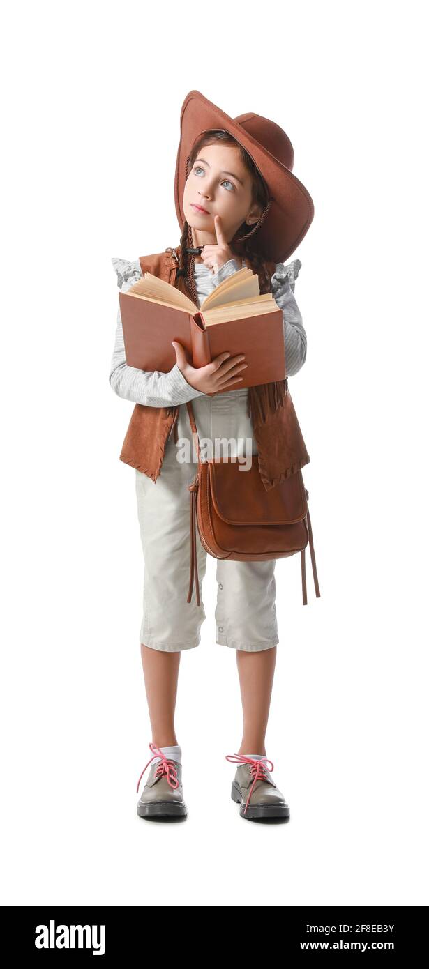 Cute little adventurer with book on white background Stock Photo - Alamy