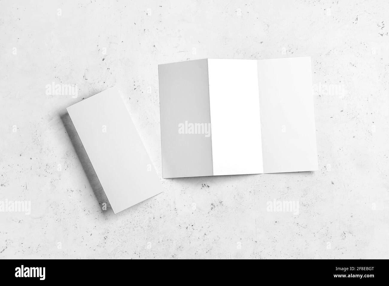 Blank brochures on light background Stock Photo - Alamy
