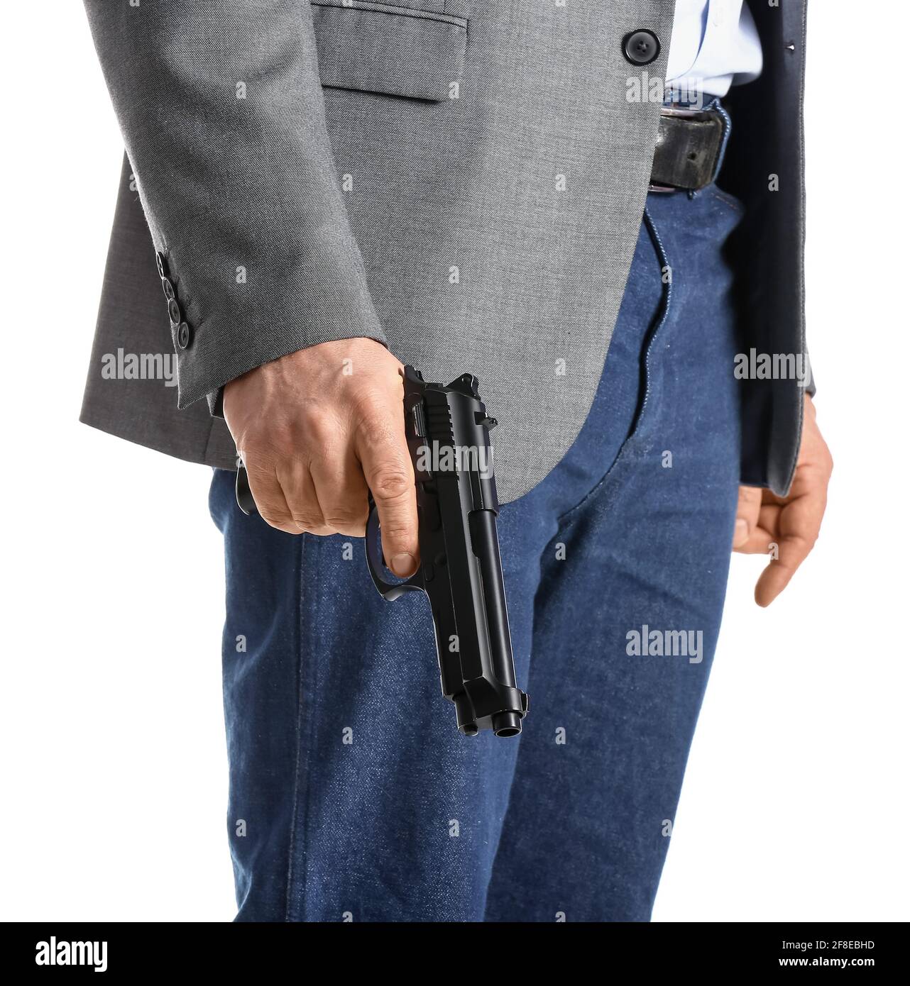 Man with gun on white background Stock Photo - Alamy