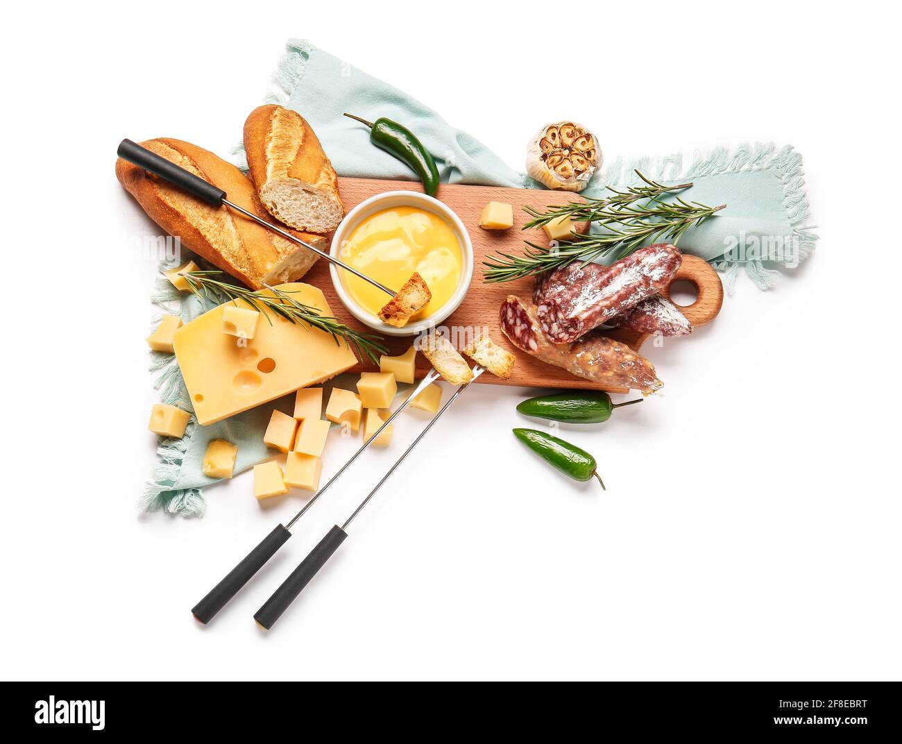 Cheese fondue and different snacks on white background Stock Photo - Alamy