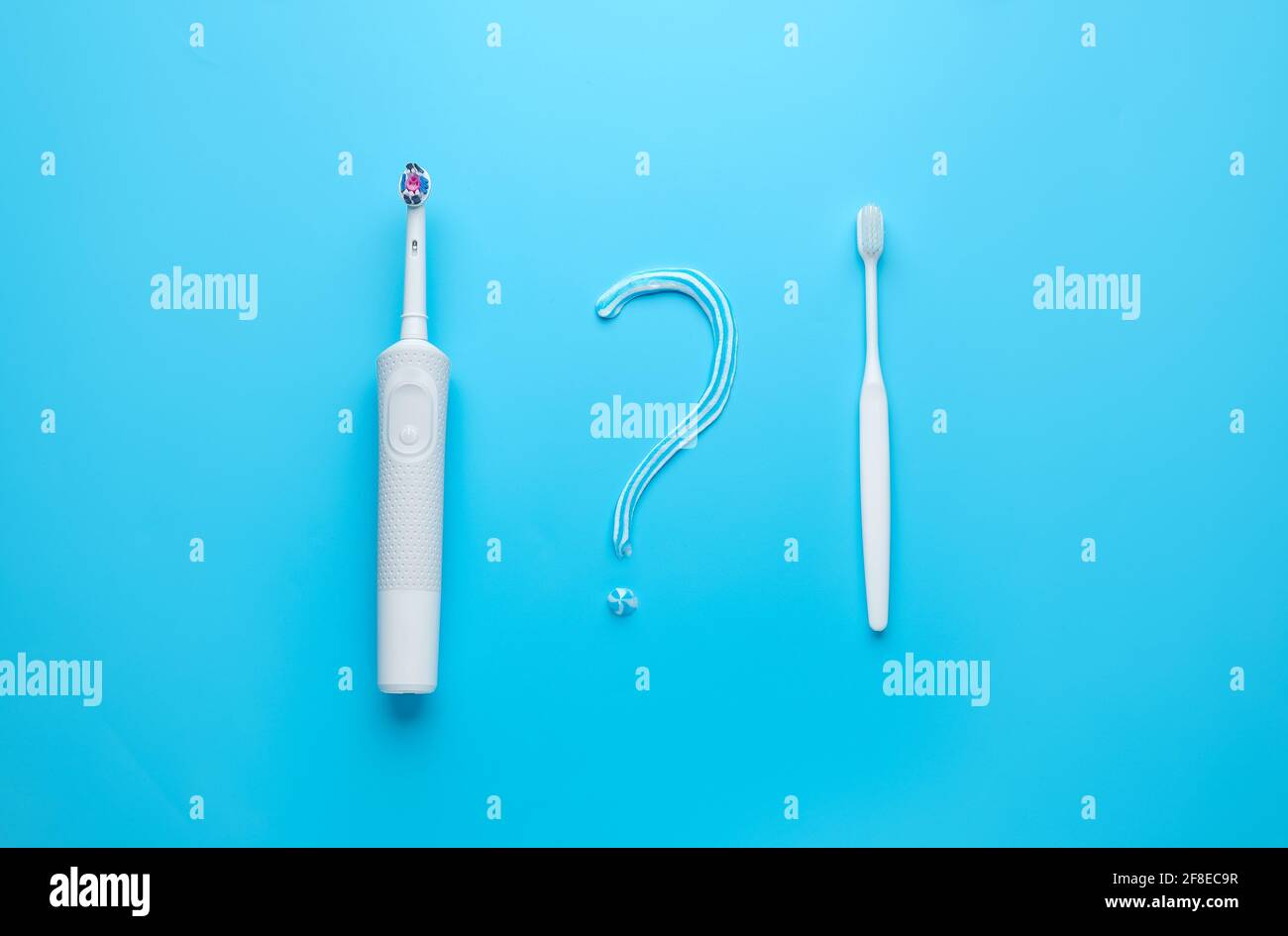 Different tooth brushes and question mark on color background Stock ...