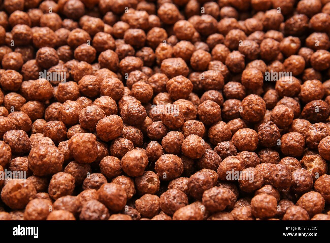 Chocolate corn balls as background, closeup Stock Photo - Alamy