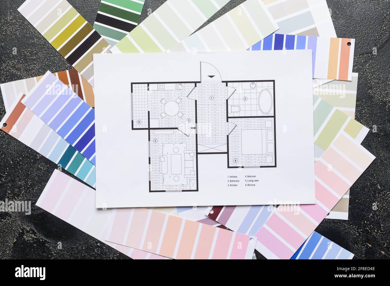 Plan of house and color samples on dark background Stock Photo - Alamy