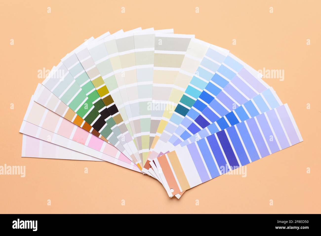 Paint color samples on beige background Stock Photo - Alamy