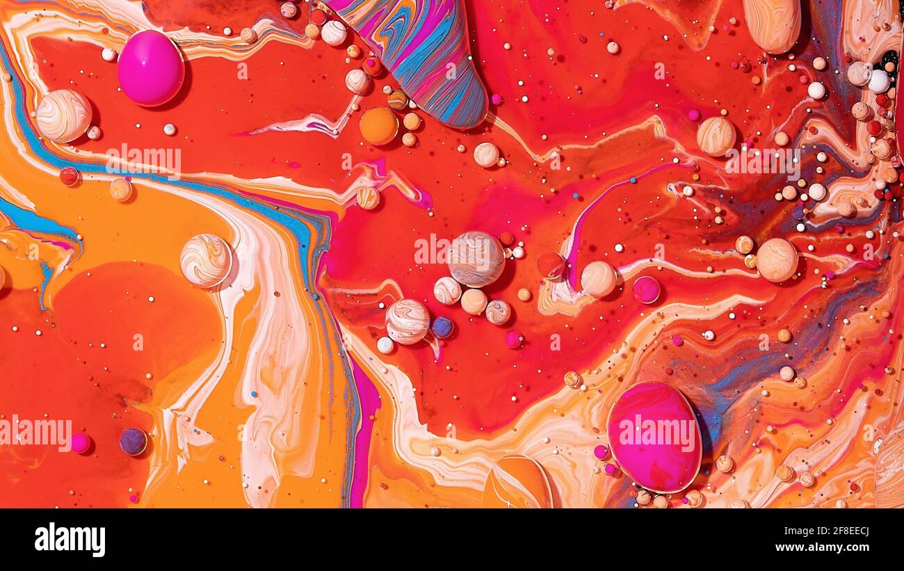 Top view of colorful vibrant rocks on a bright red surface for ...