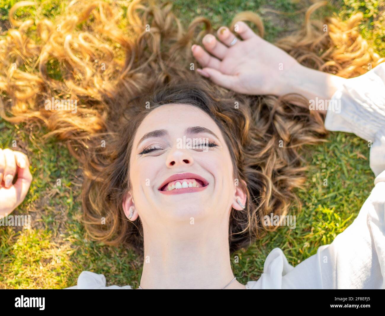 Lying spread out and and relaxing hi-res stock photography and images ...