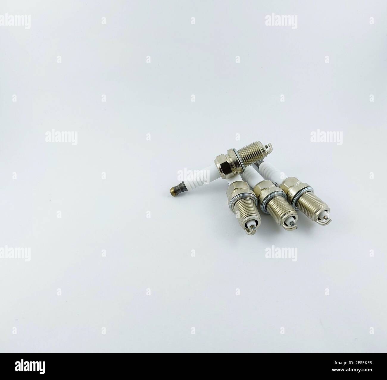 Closeup shot of new spark plugs isolated on white background Stock ...