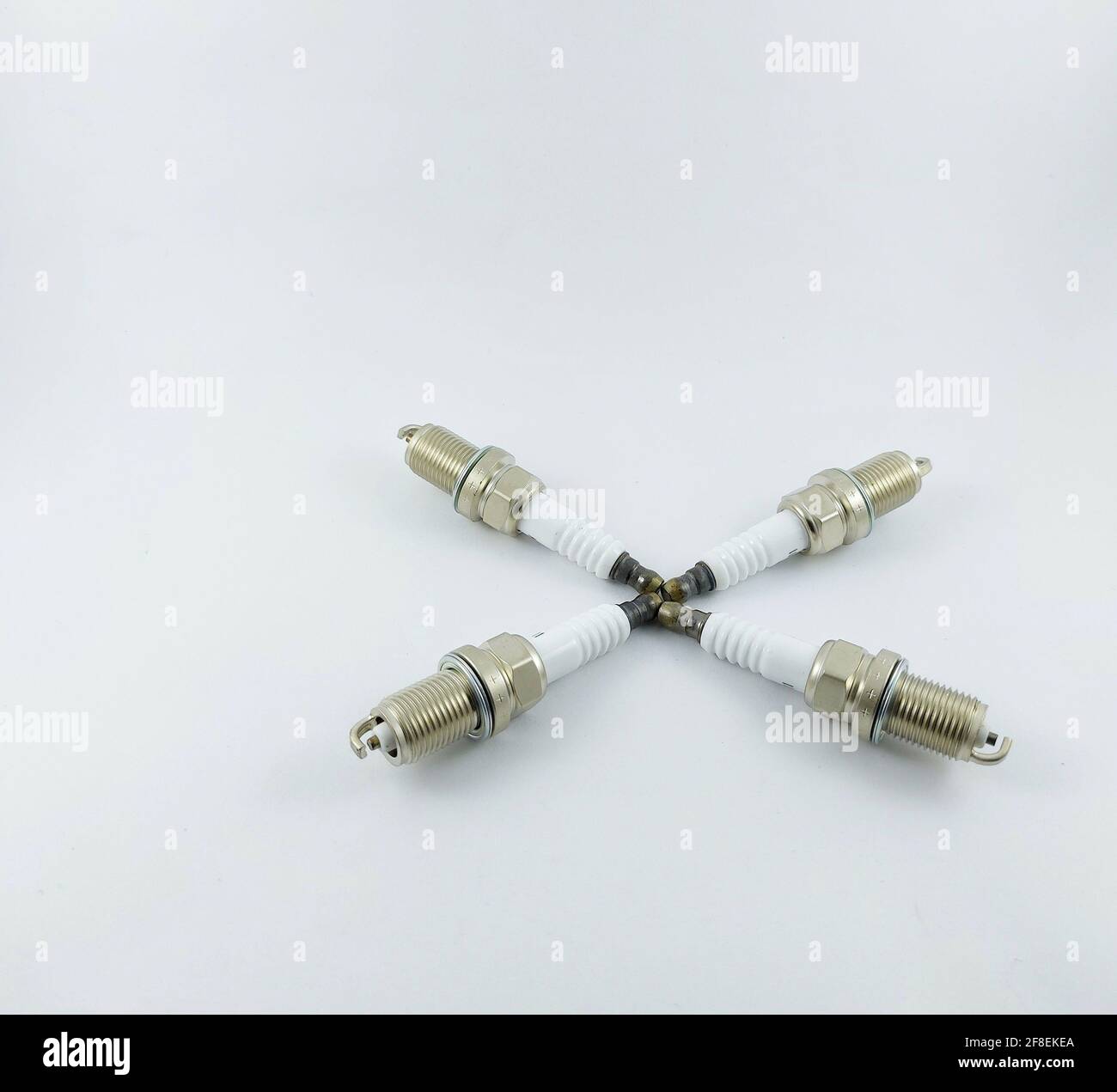 Closeup shot of new spark plugs isolated on white background Stock ...