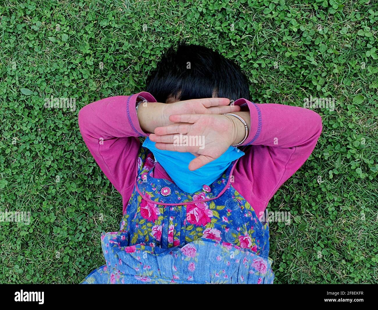 Masked kids playing Stock Photo - Alamy
