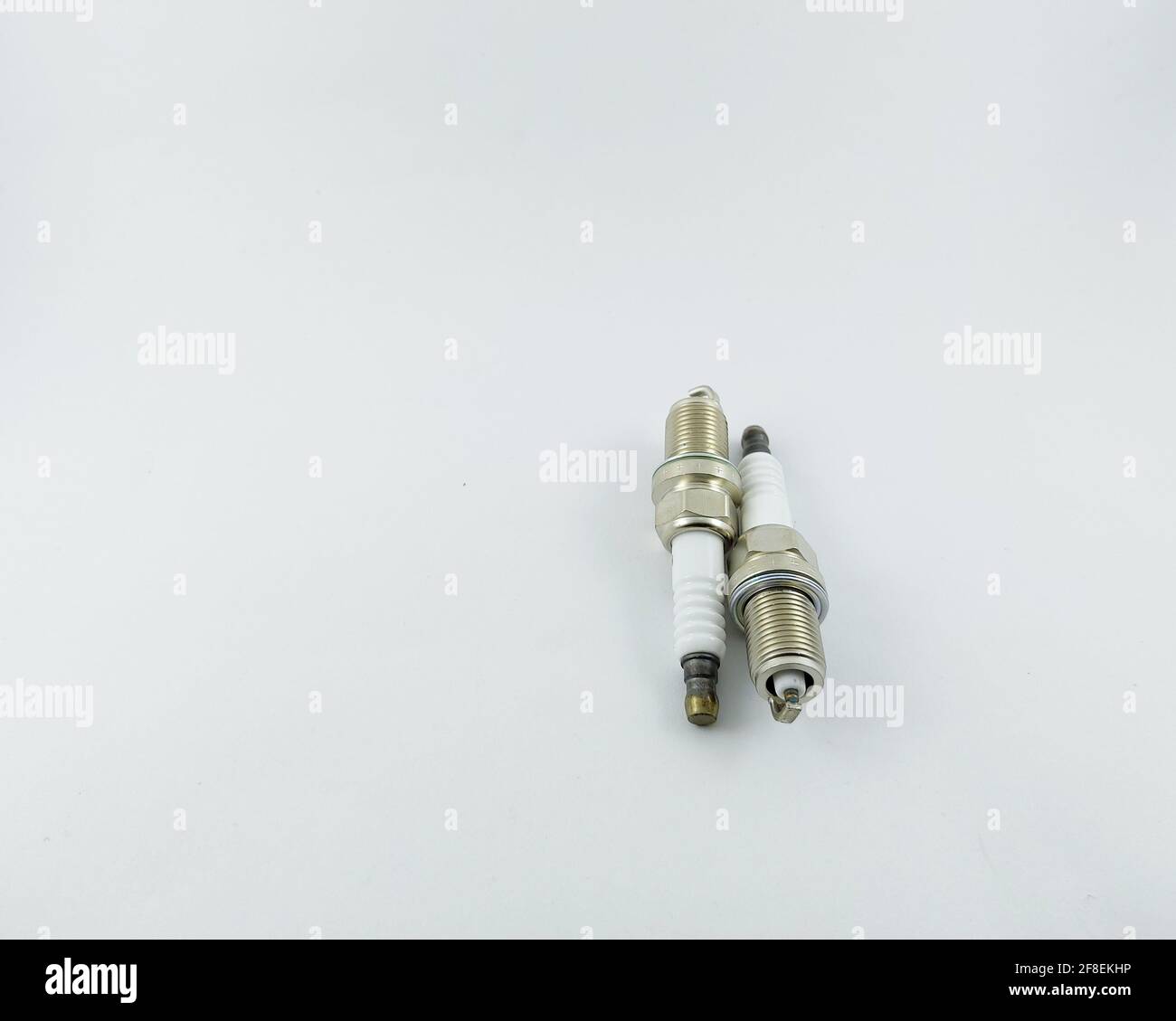 Closeup shot of new spark plugs isolated on white background Stock ...
