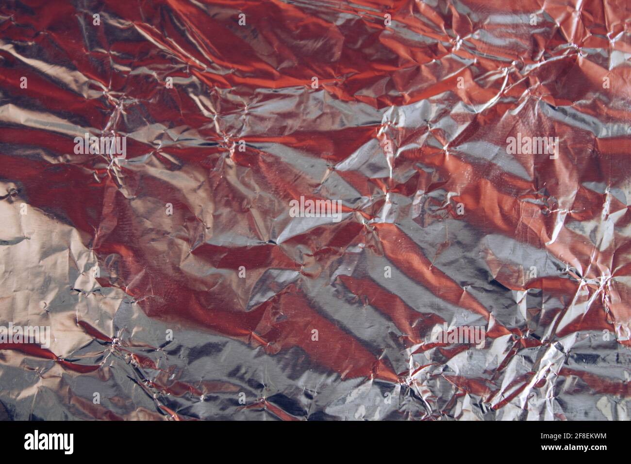 Crumpled foil texture. Crumpled paper is shiny with a color tint Stock ...