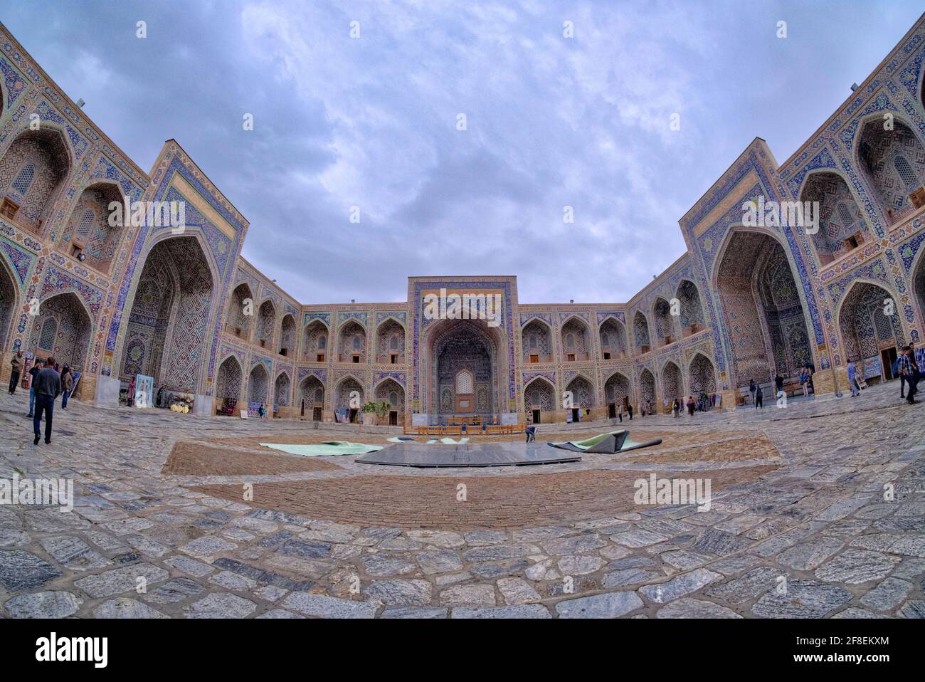 The Registan Square, paved with fired bricks and cobbles, and the ...