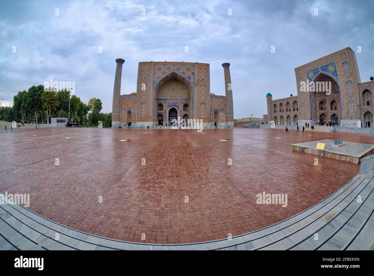The Registan Square, paved with fired bricks and cobbles, and the ...