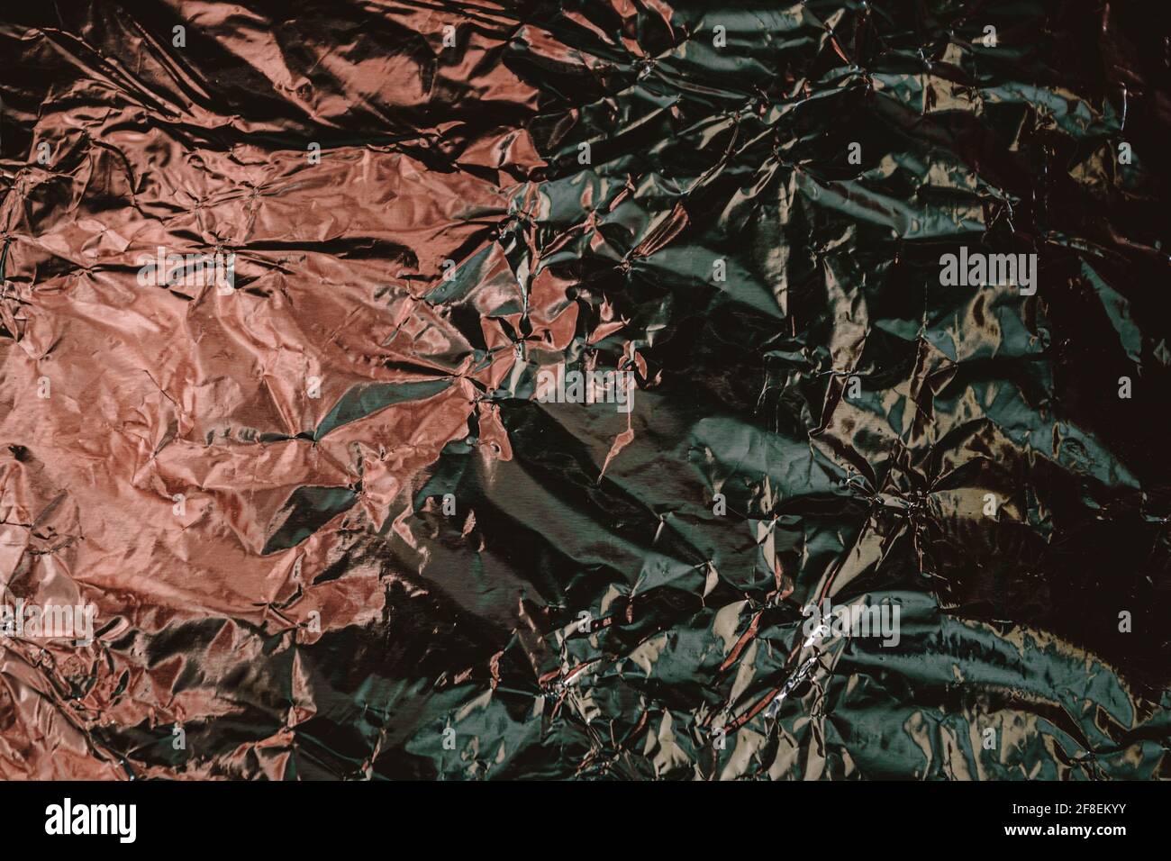 Crumpled foil texture. Crumpled paper is shiny with a color tint Stock ...