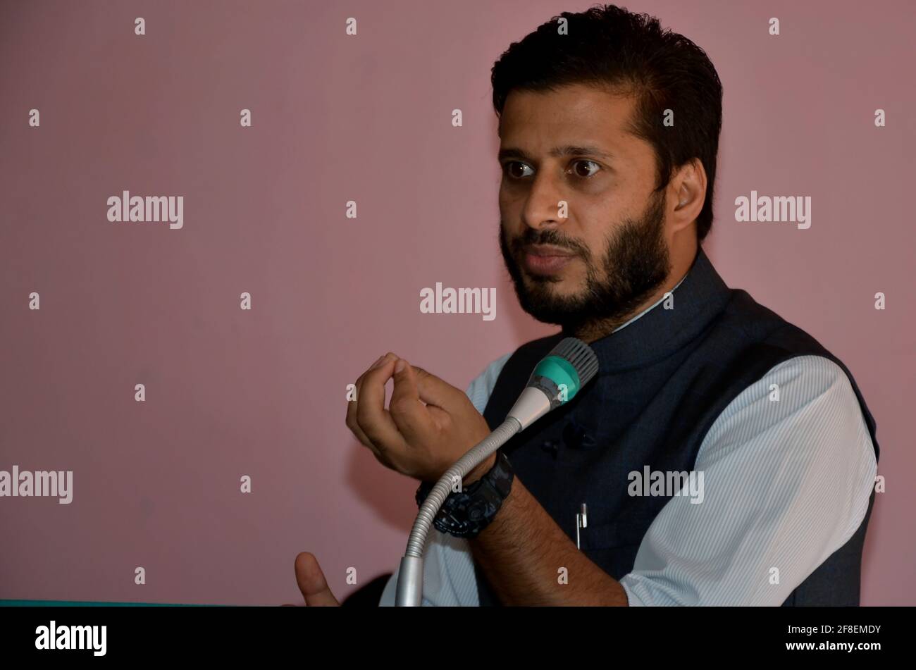 Man asian is giving lecture in a public hall during a function Stock ...