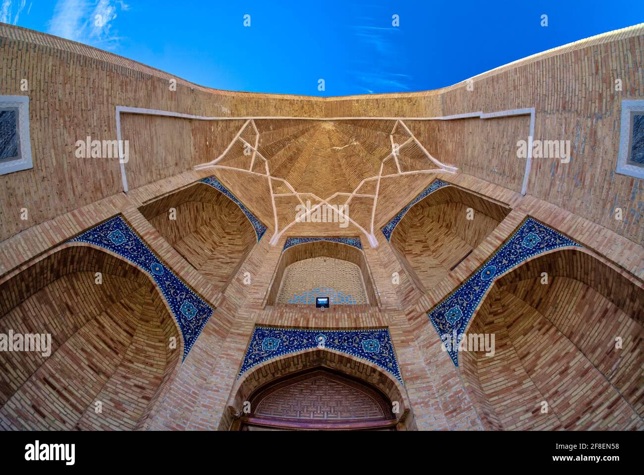 The Madrasah was built of brick and topped with three blue domes. The ...