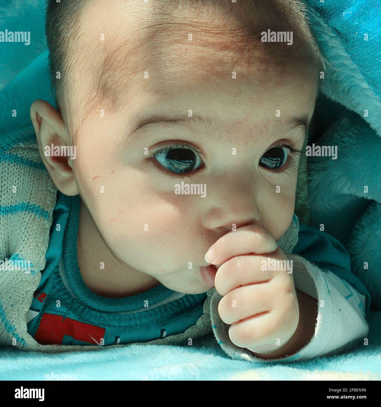 Innocent new born baby kid asian colour looks very beautiful Stock ...