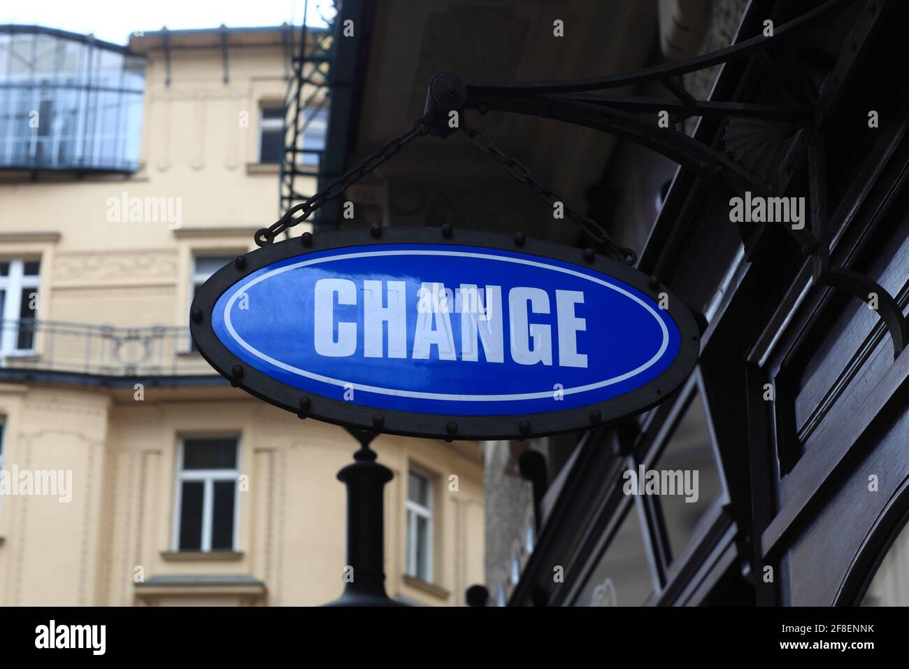 Change signboard on a street of city Stock Photo - Alamy
