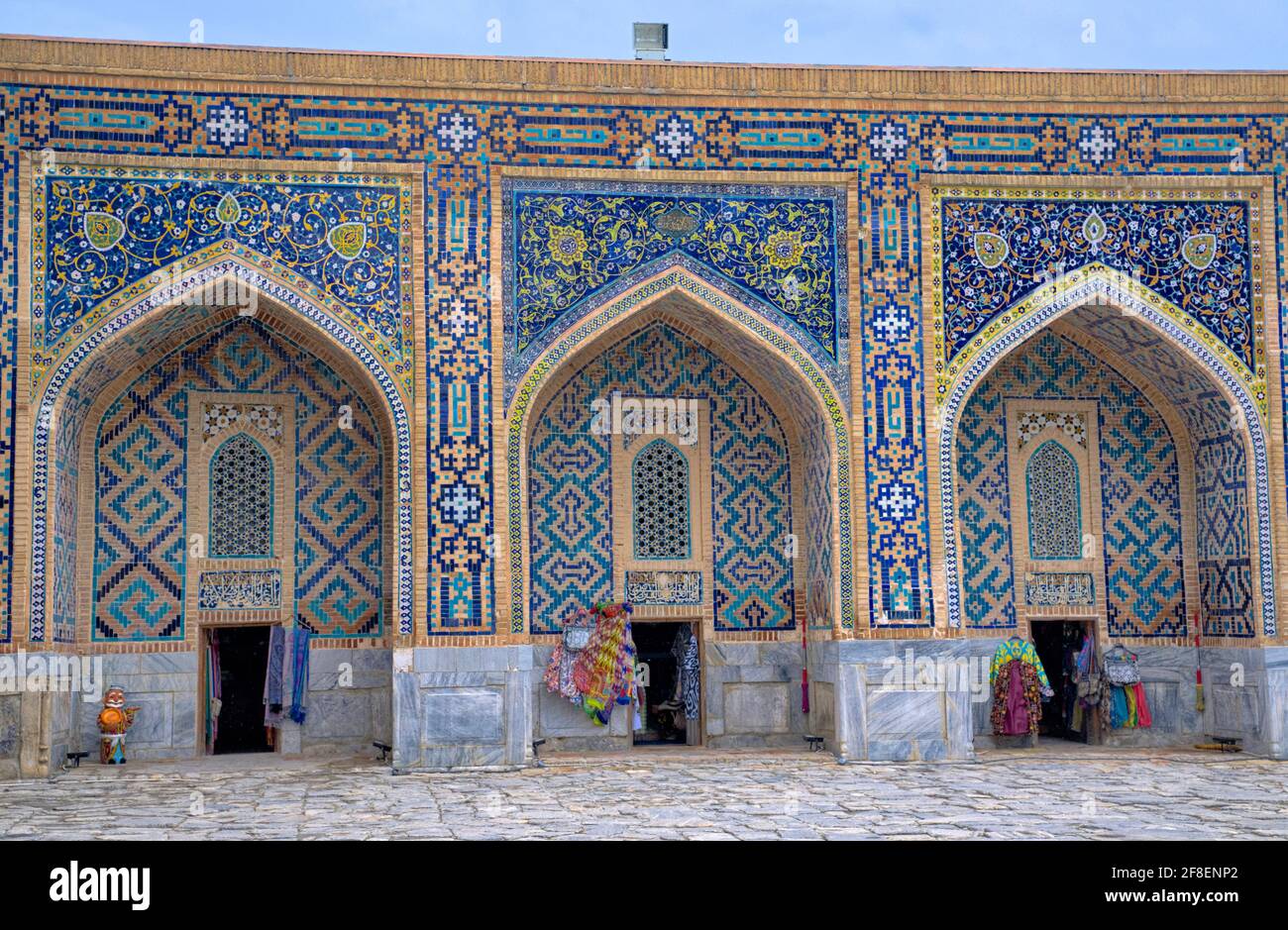 The Registan Square, paved with fired bricks and cobbles, and the ...