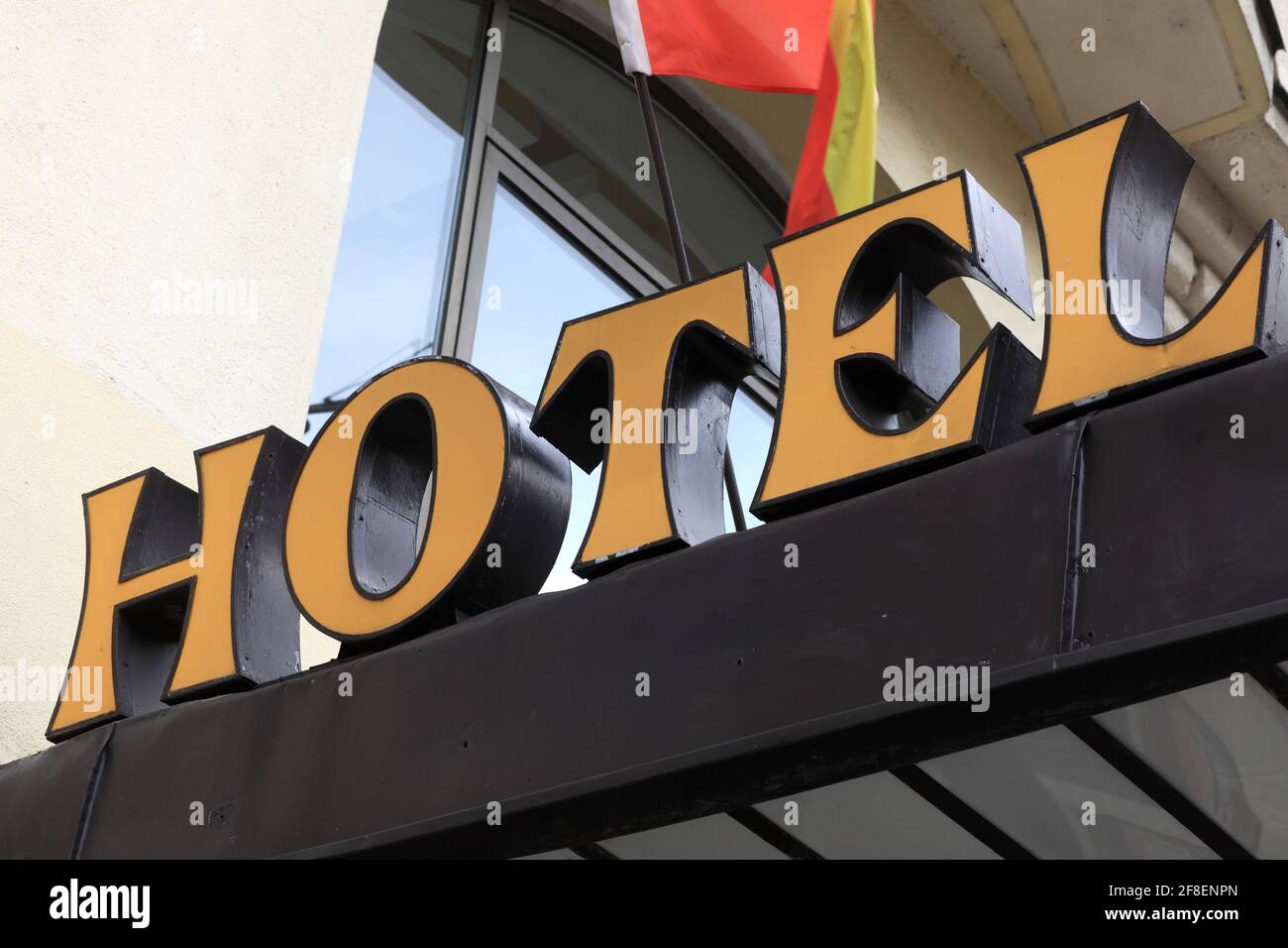 Hotel signboard on the wall of building Stock Photo - Alamy
