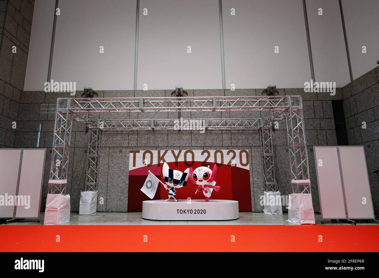 Tokyo, JPN. 14th Apr, 2021. The unveiled statues of Miraitowa, center ...