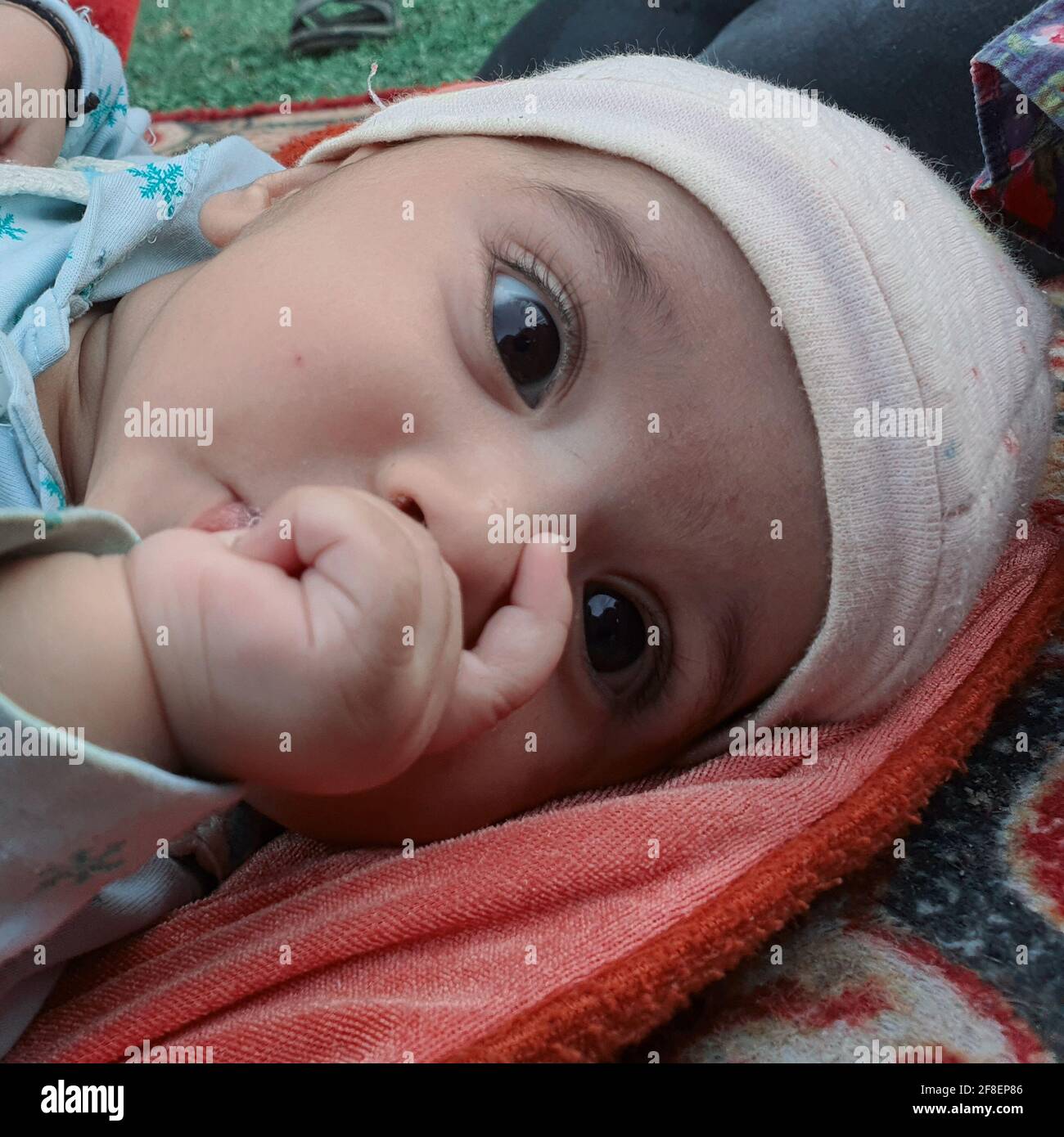 Innocent new born baby kid asian colour looks very beautiful Stock ...
