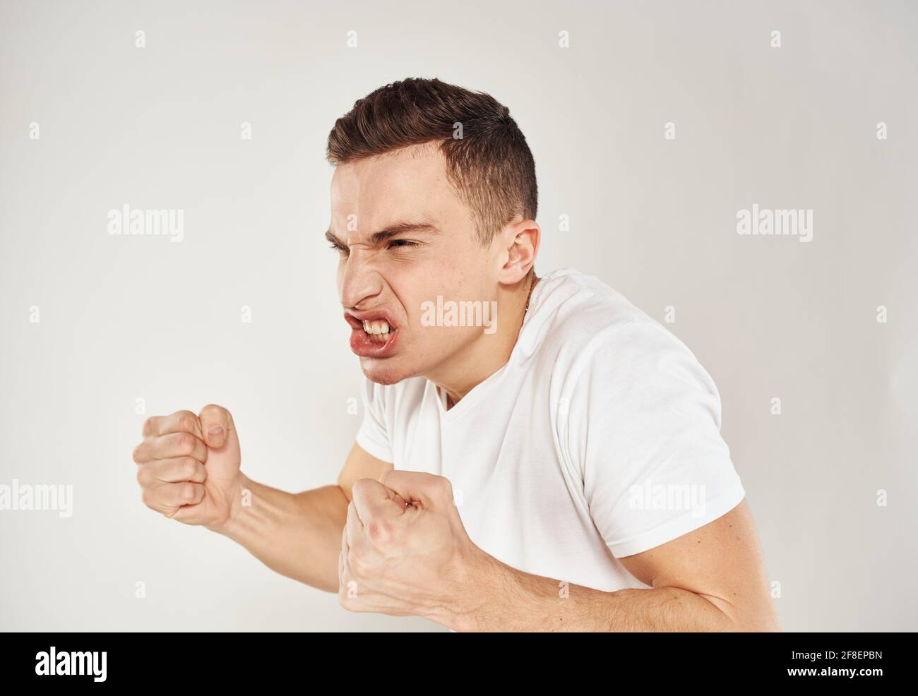 Emotions man irritability wide open mouth grin model cropped view Stock ...