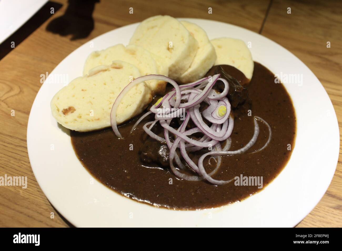 Old Prague beef goulash with red onion and homemade bread dumplings ...
