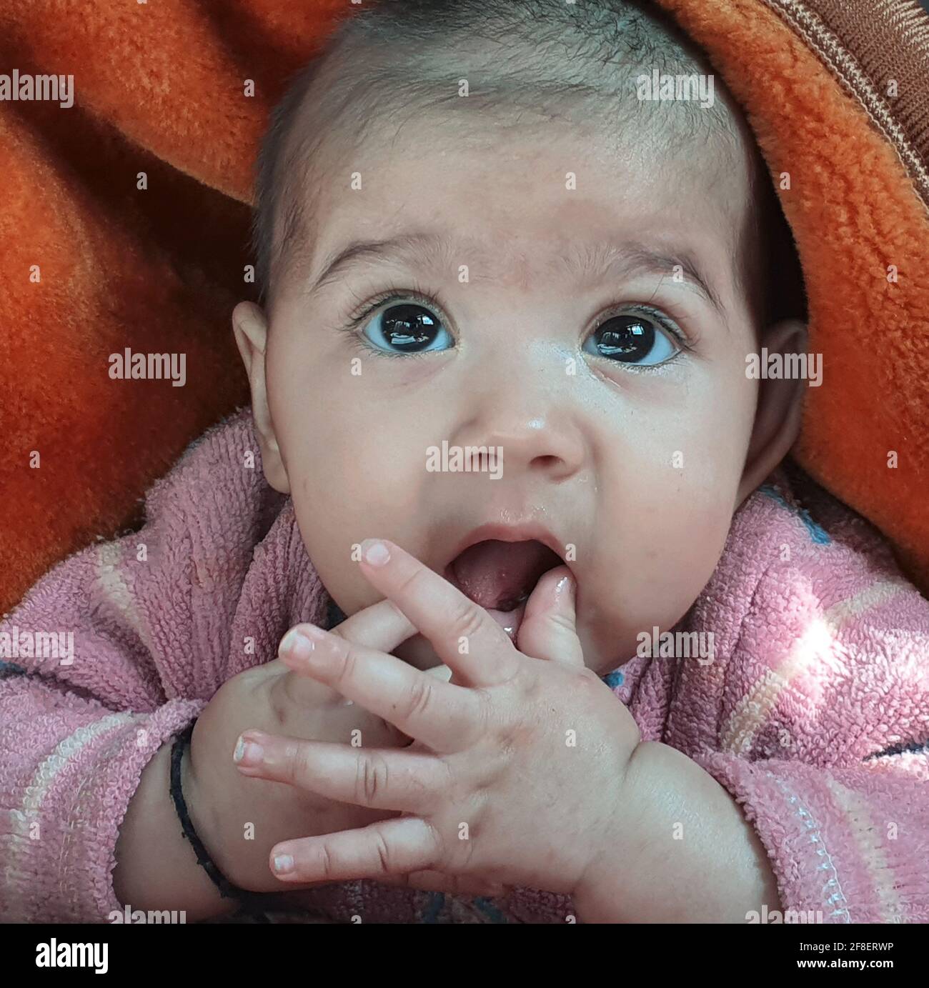 Innocent new born baby kid asian colour looks very beautiful Stock ...