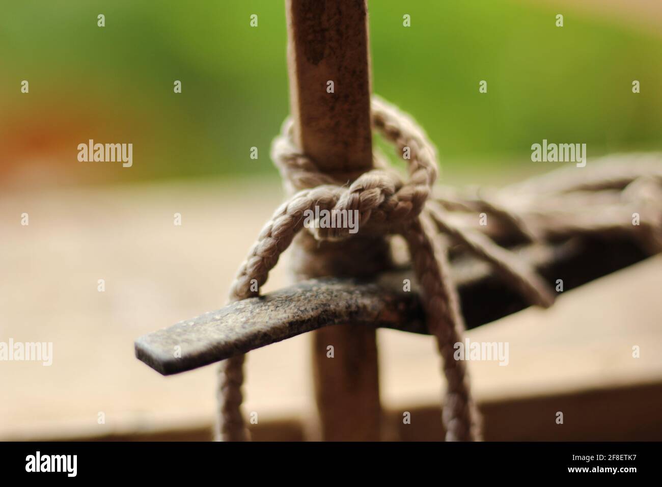 Knotted twine with window handle Stock Photo - Alamy