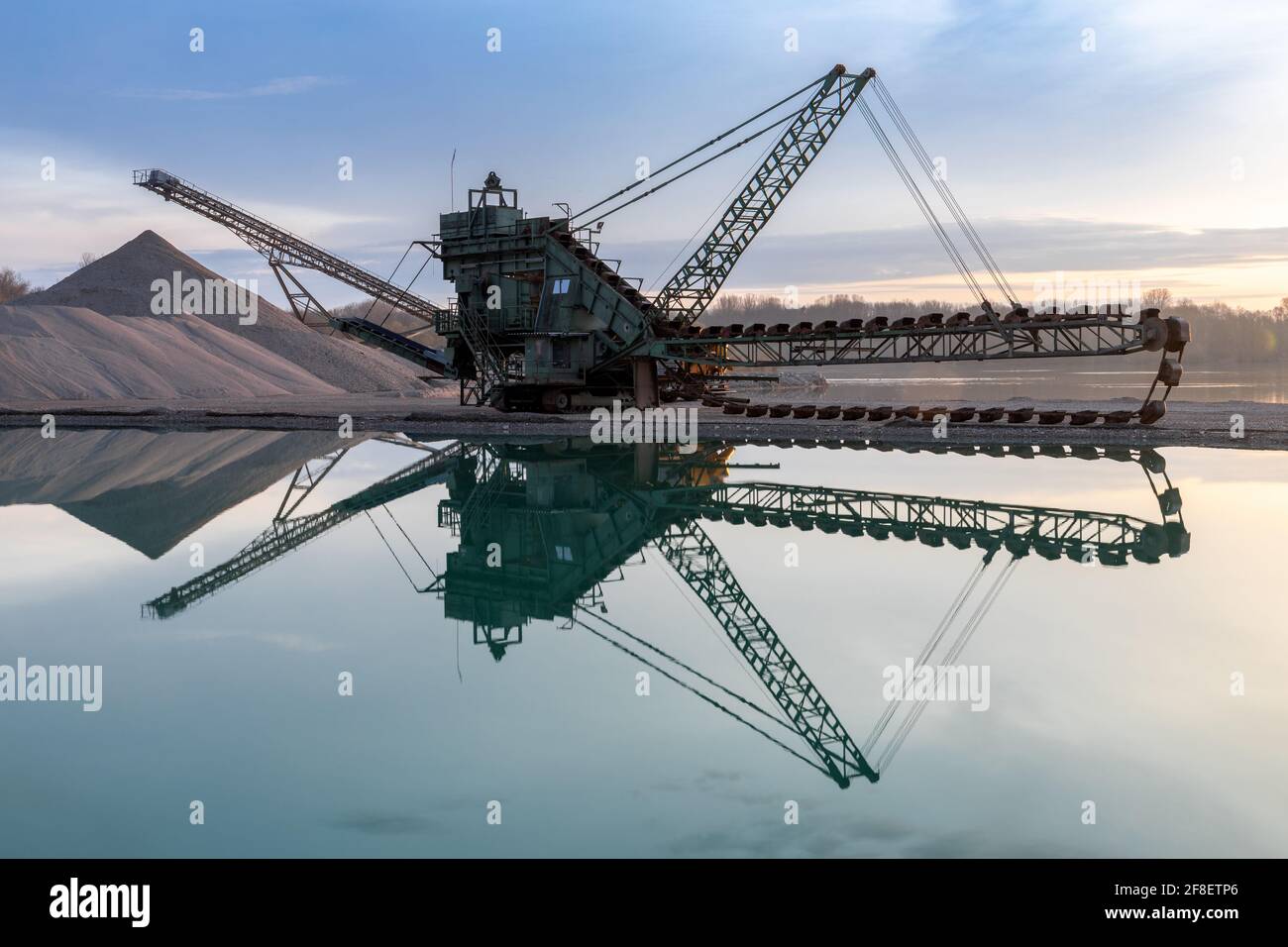 Excavator in a gravel plant in Bavaria, Germany Stock Photo - Alamy