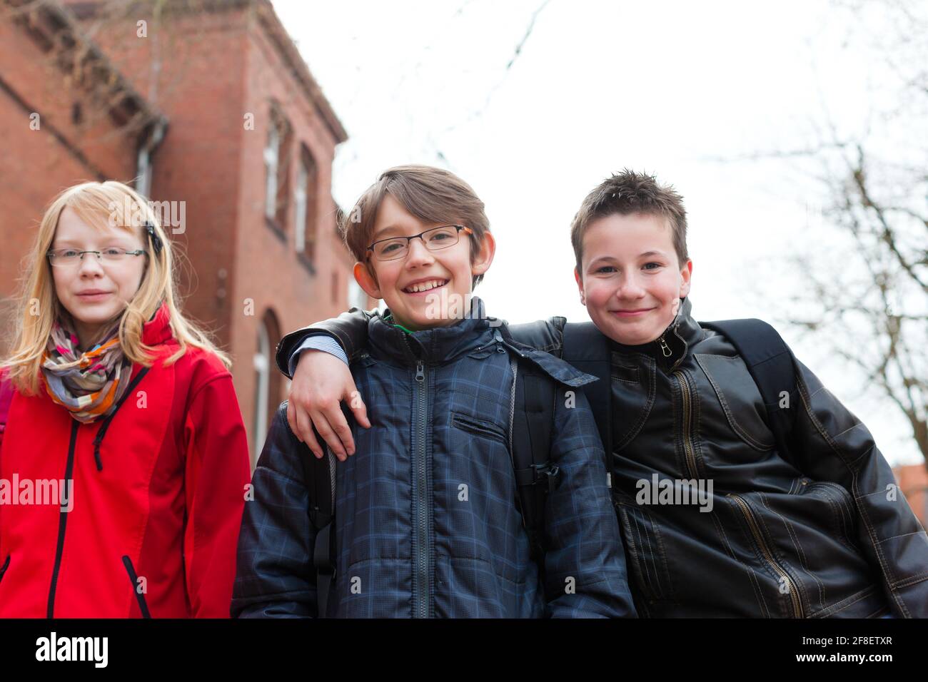Education - Pupils at schoolyard of their school during recess Stock ...
